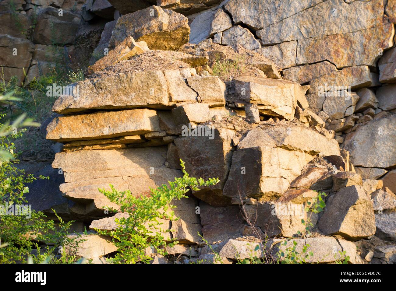 Texture of a large granite rock made of stones - marble stone quarry ...
