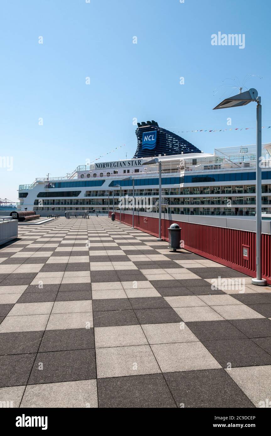 The Norwegian Star cruise ship and checkerboard walkway around Pier 70 ...