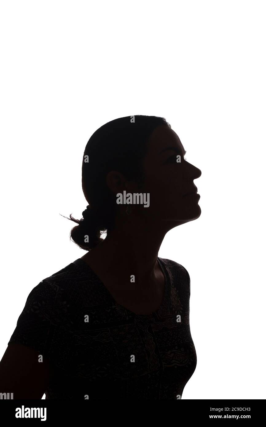 Portrait of a young woman, pensive, thinking side view - silhouette ...