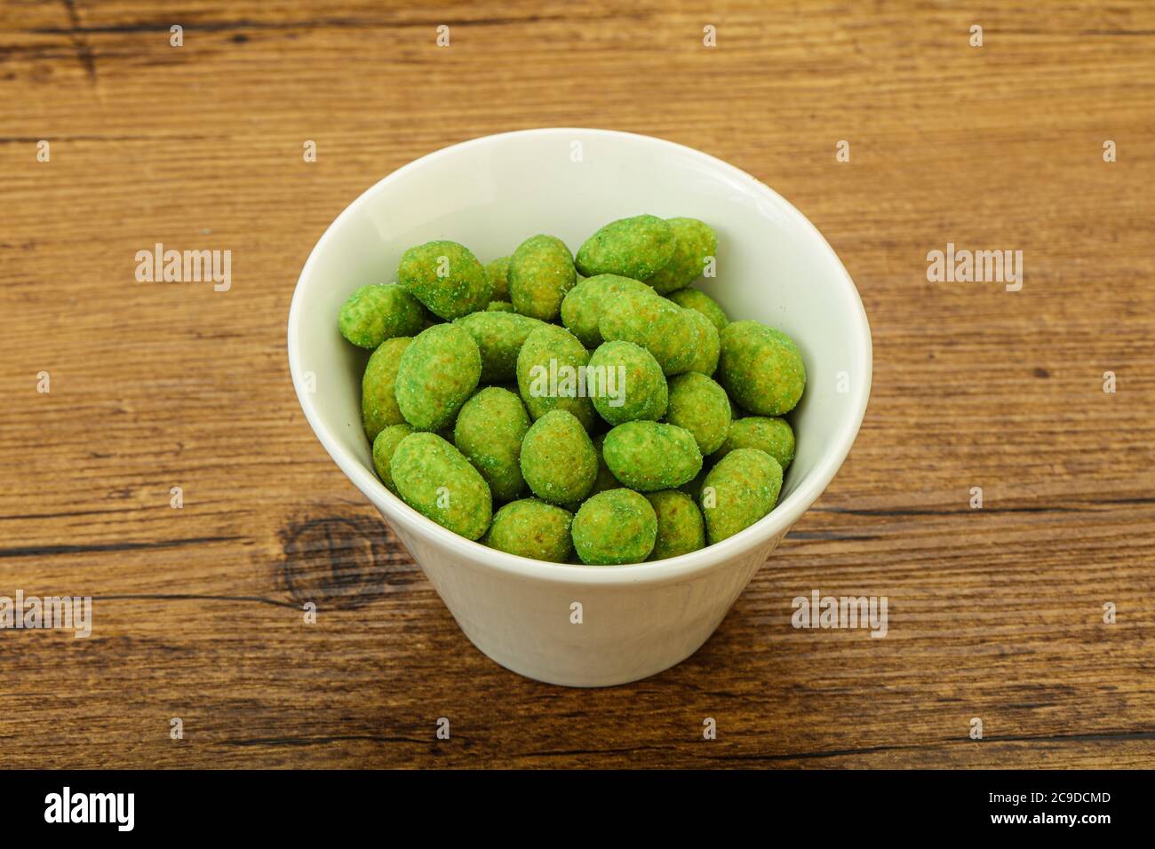 Spicy wasabi peanuts snack in the bowl Stock Photo - Alamy