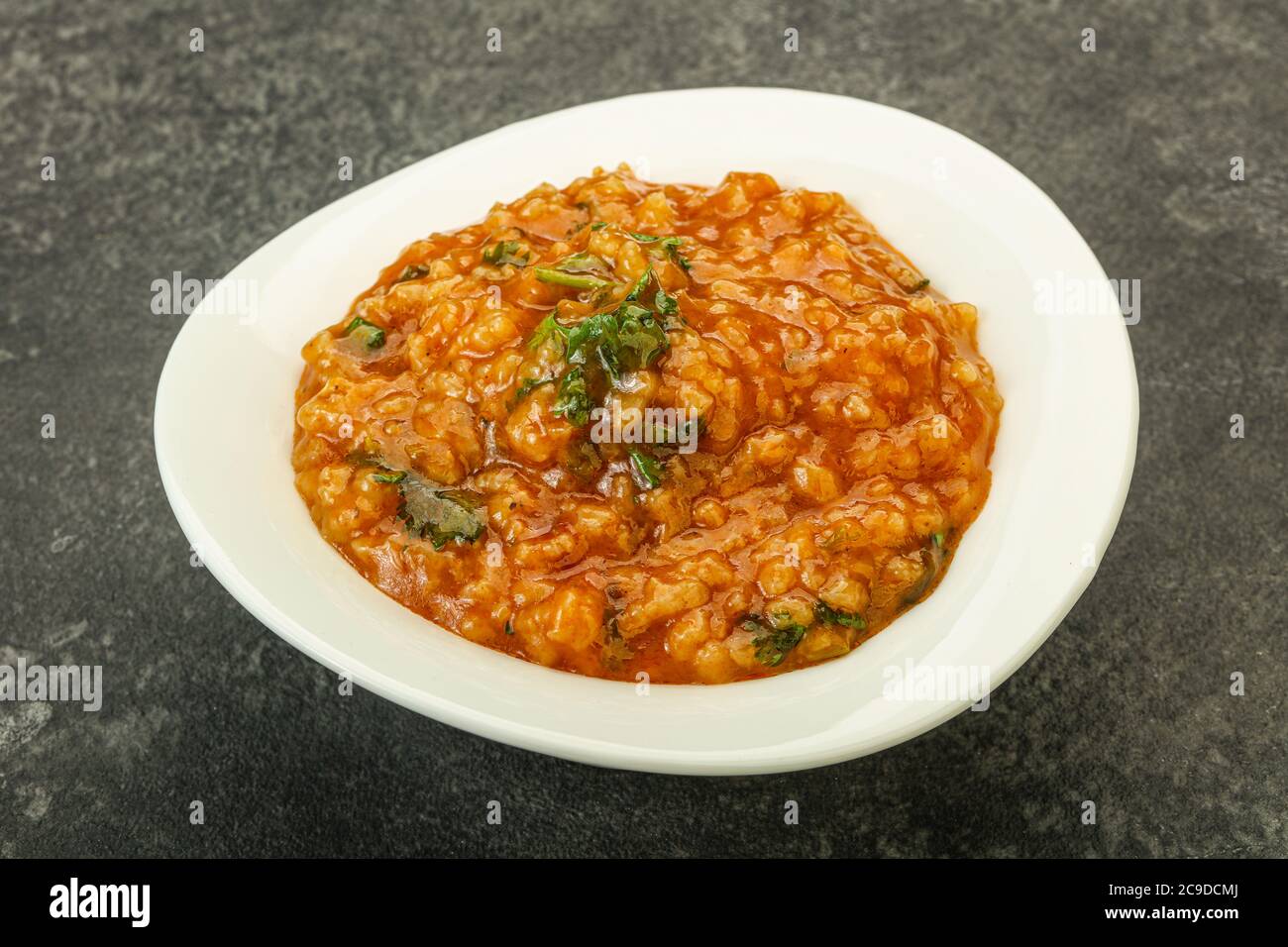 Traditional Georgian Kharcho soup with meat and spices Stock Photo - Alamy