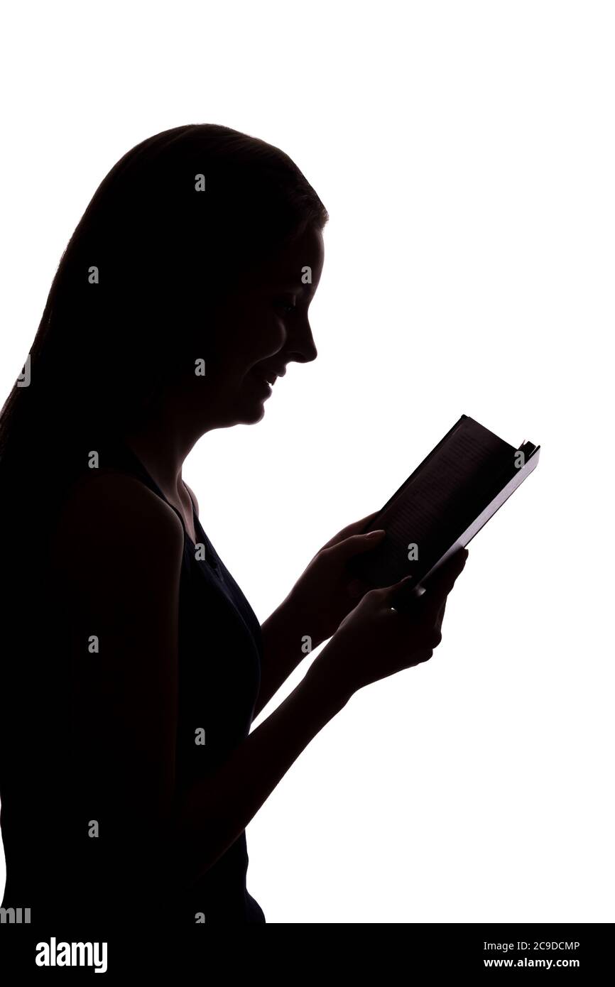 Girl read a book - silhouette, isolate Stock Photo - Alamy