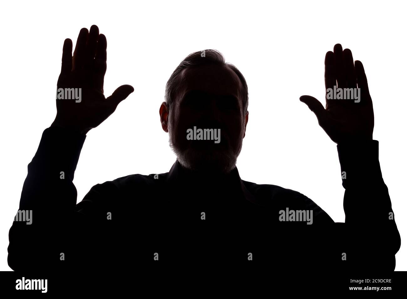 The old of a young man covers his face, hands up, protest - silhouette ...