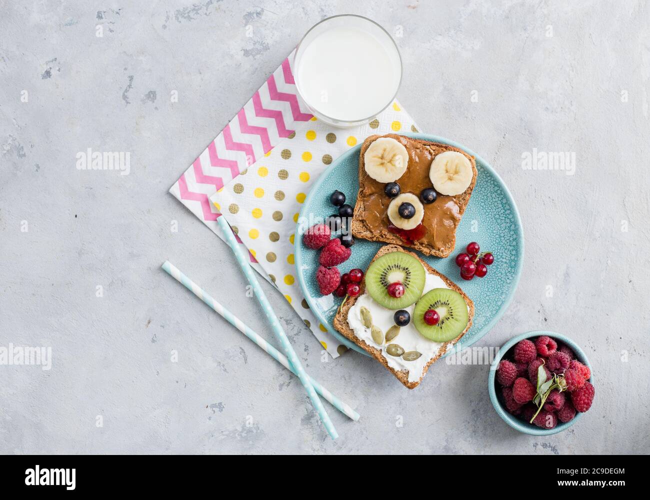 Funny breakfast toast for kids shaped as cute dog, bear. Food art ...