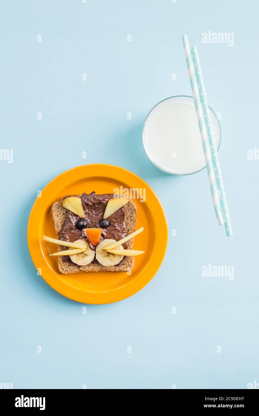 Funny breakfast toast for kids shaped as cute cat. Food art sandwich ...