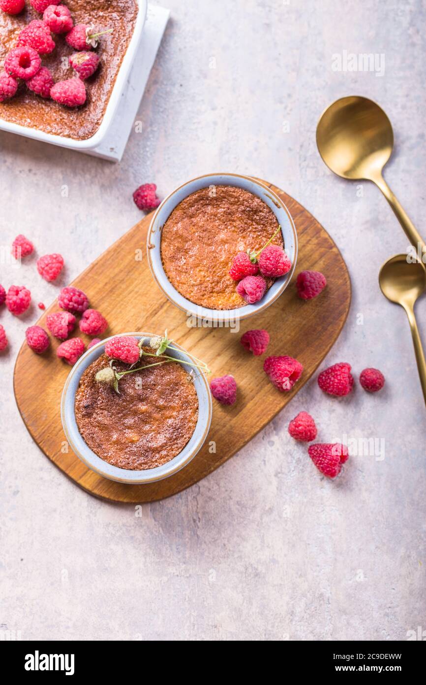 Rice pudding. French milk rice dessert with raspberries Stock Photo - Alamy