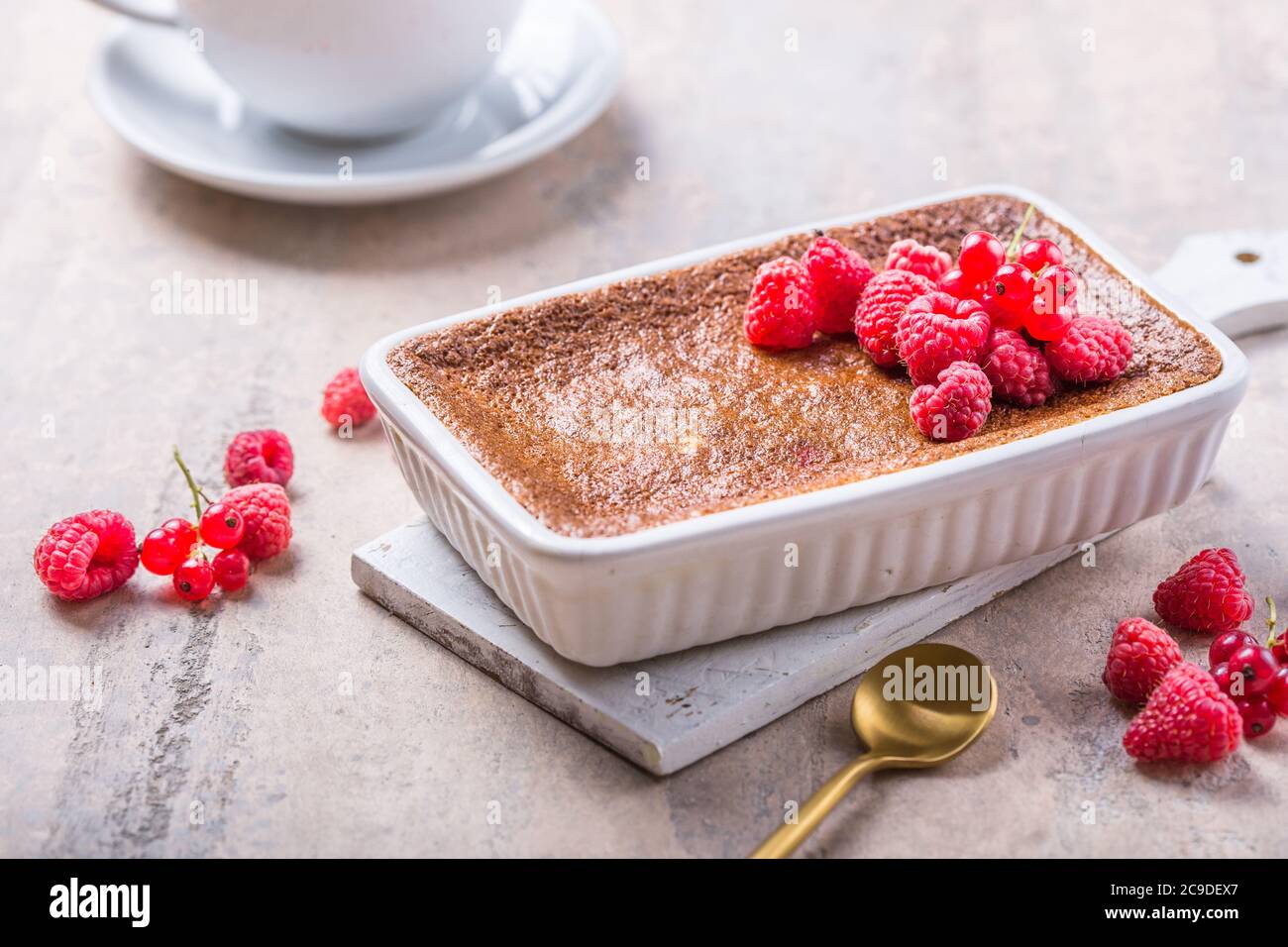 Rice pudding. French milk rice dessert with raspberries Stock Photo - Alamy