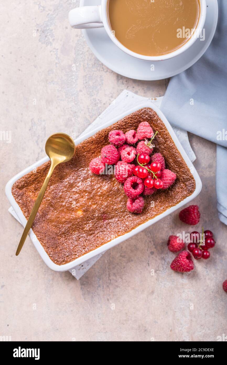 Rice pudding. French milk rice dessert with raspberries Stock Photo - Alamy