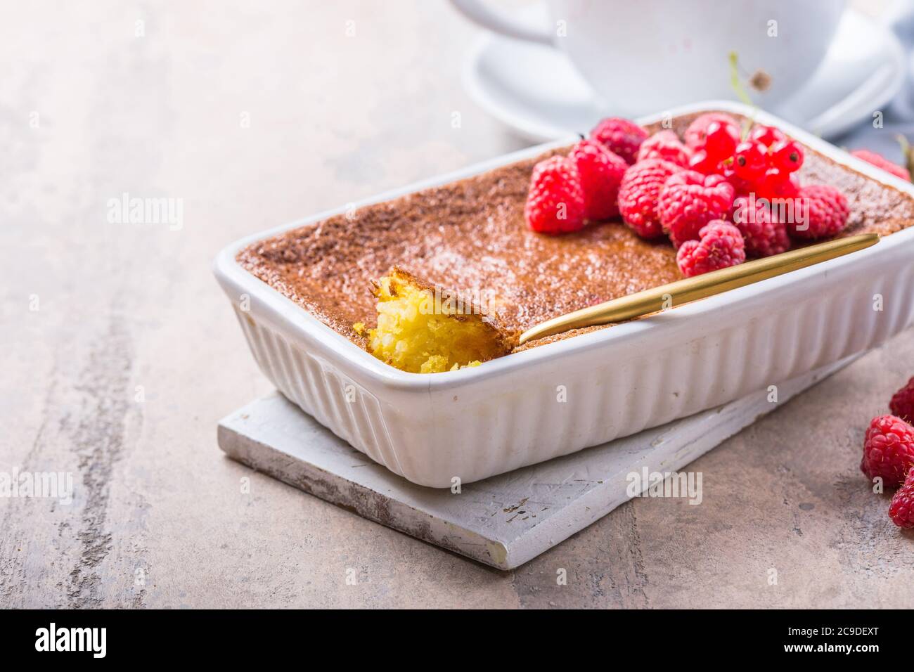 Rice pudding. French milk rice dessert with raspberries Stock Photo - Alamy