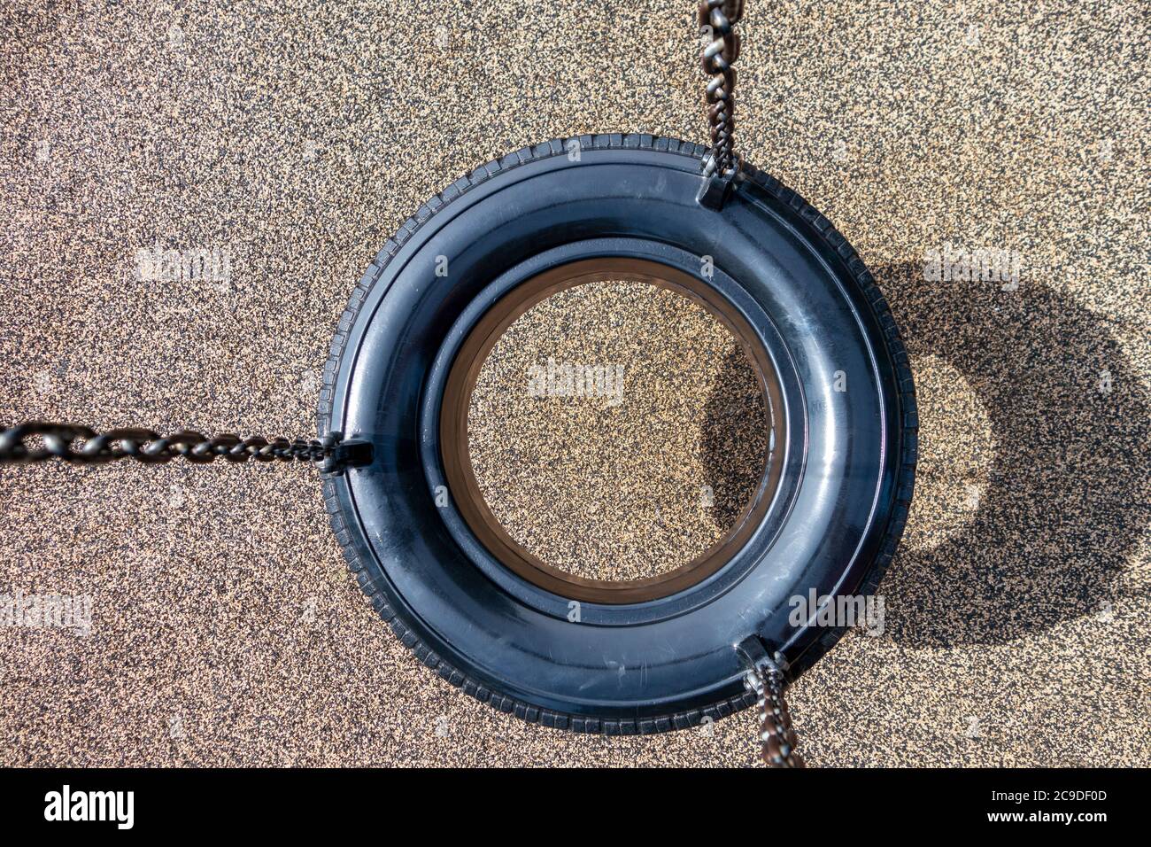 Overhead view of a tire swing on a kids playing park Stock Photo - Alamy