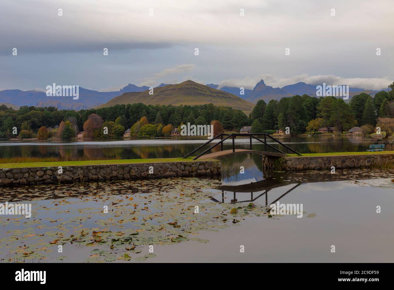 Pedestrian walk way and bridge Lake Naverone Drakensberg Stock Photo ...