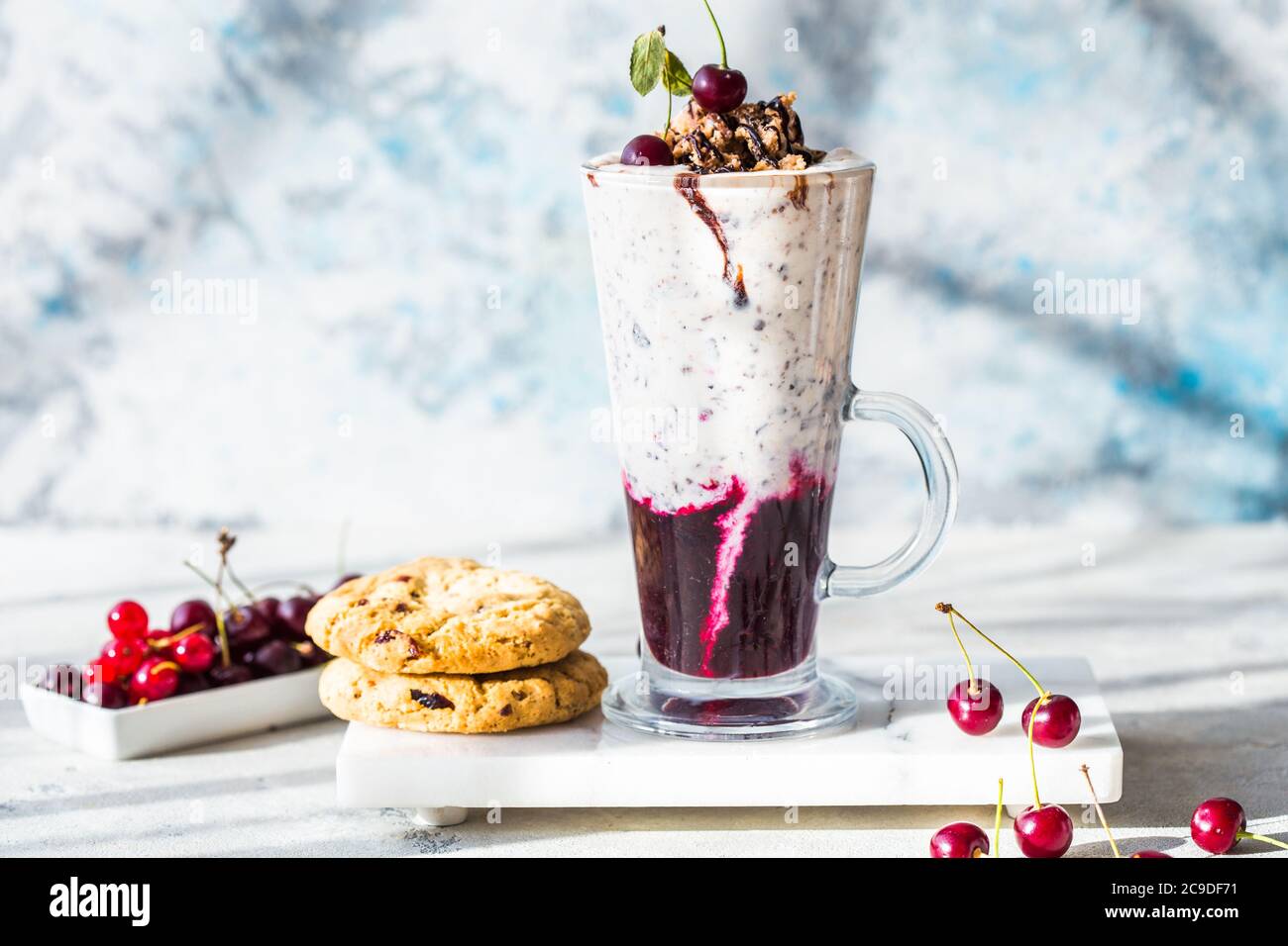 Sweet cold Ice cream sundae with chocolate, vanilla and cherry ...