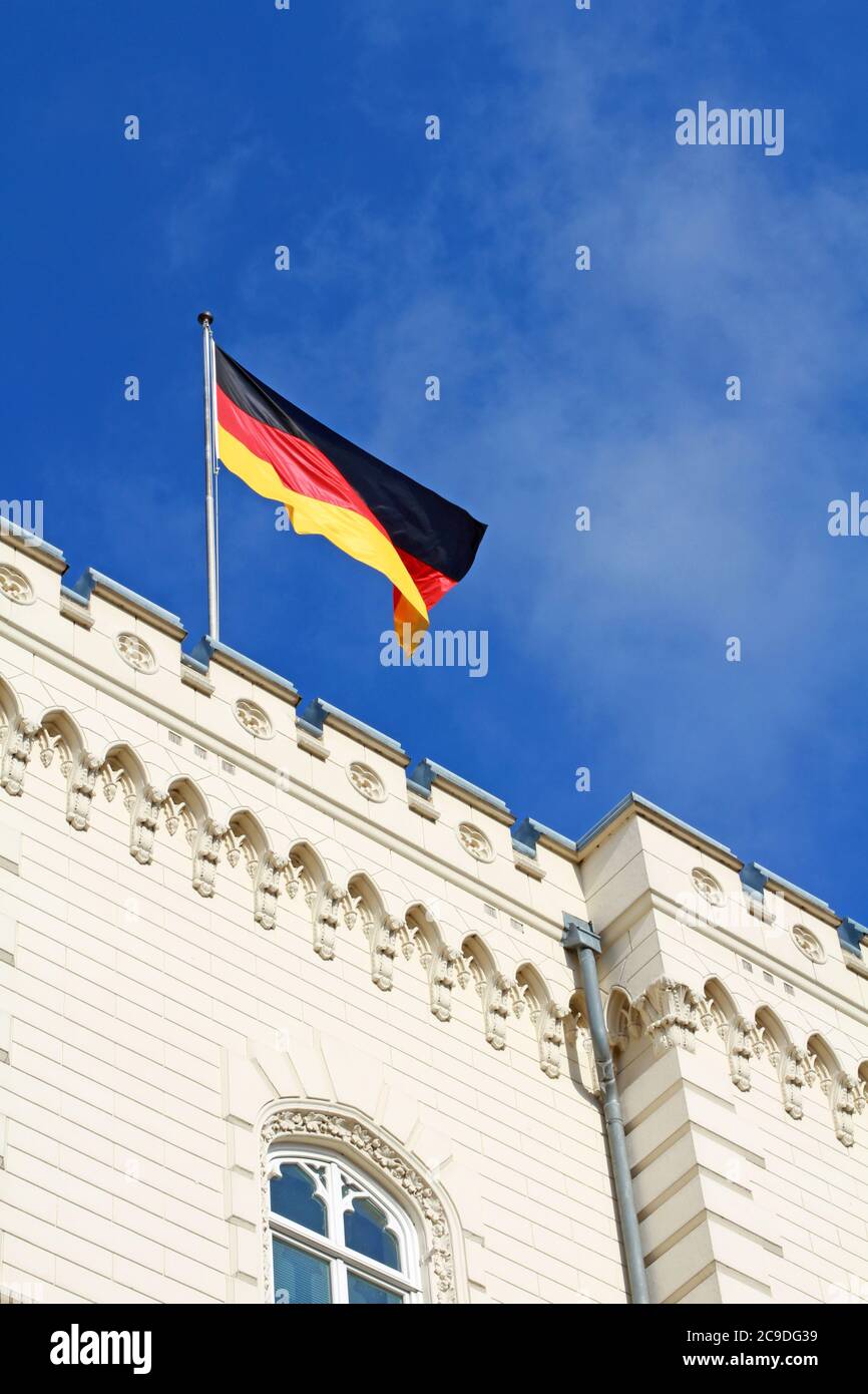 german flag on a building with pinnacles Stock Photo - Alamy