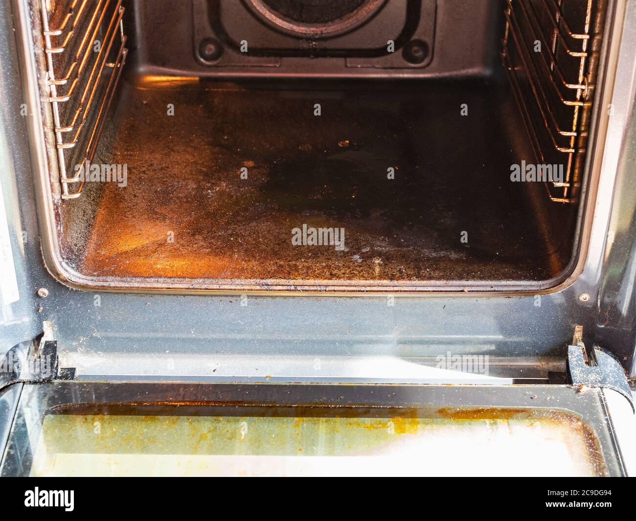 cleaning oven in home kitchen - view of inner chamber of oven with ...