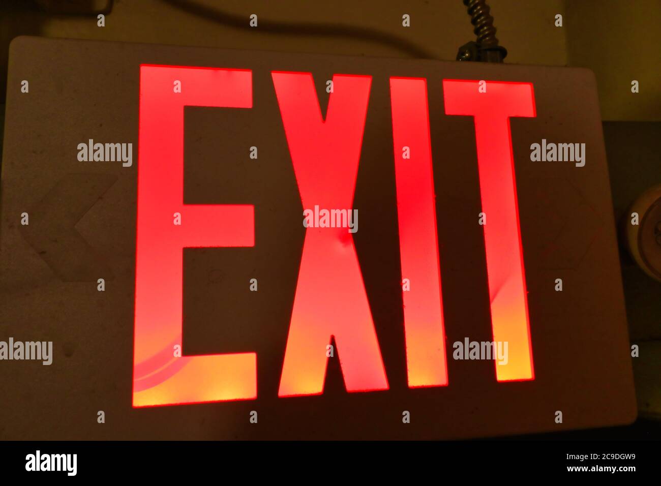 a exit sign indicates the exit Stock Photo - Alamy