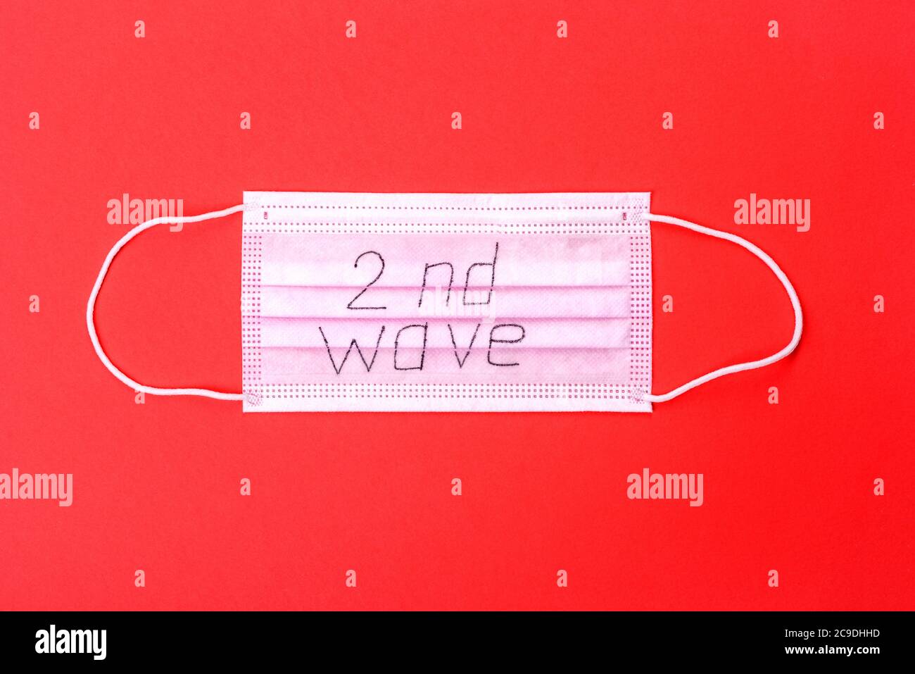 Covid 19 second wave. Covid 19. Medical mask on colors background and ...
