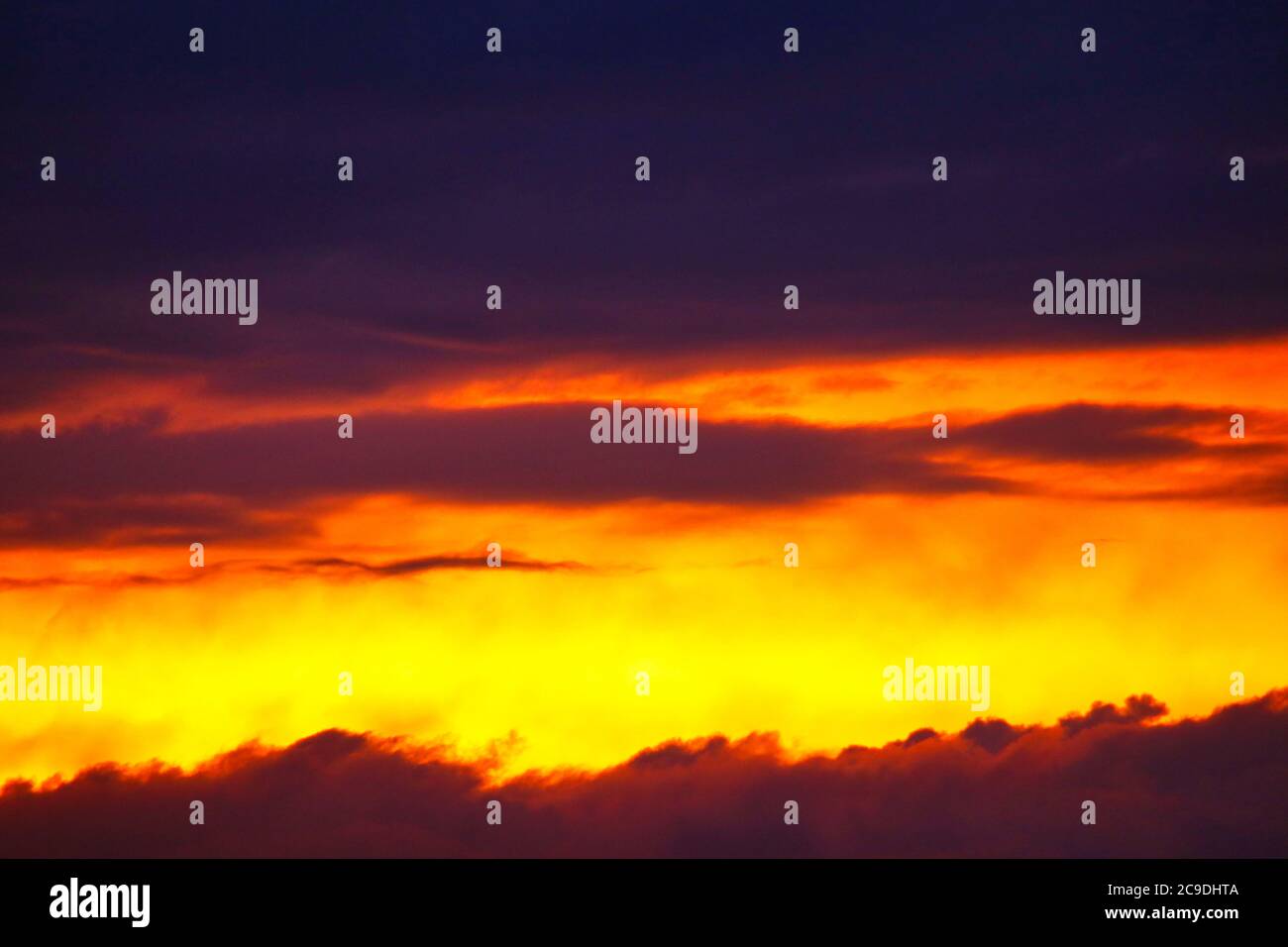 Blue and orange sun rays light in sky with cloudy Stock Photo - Alamy