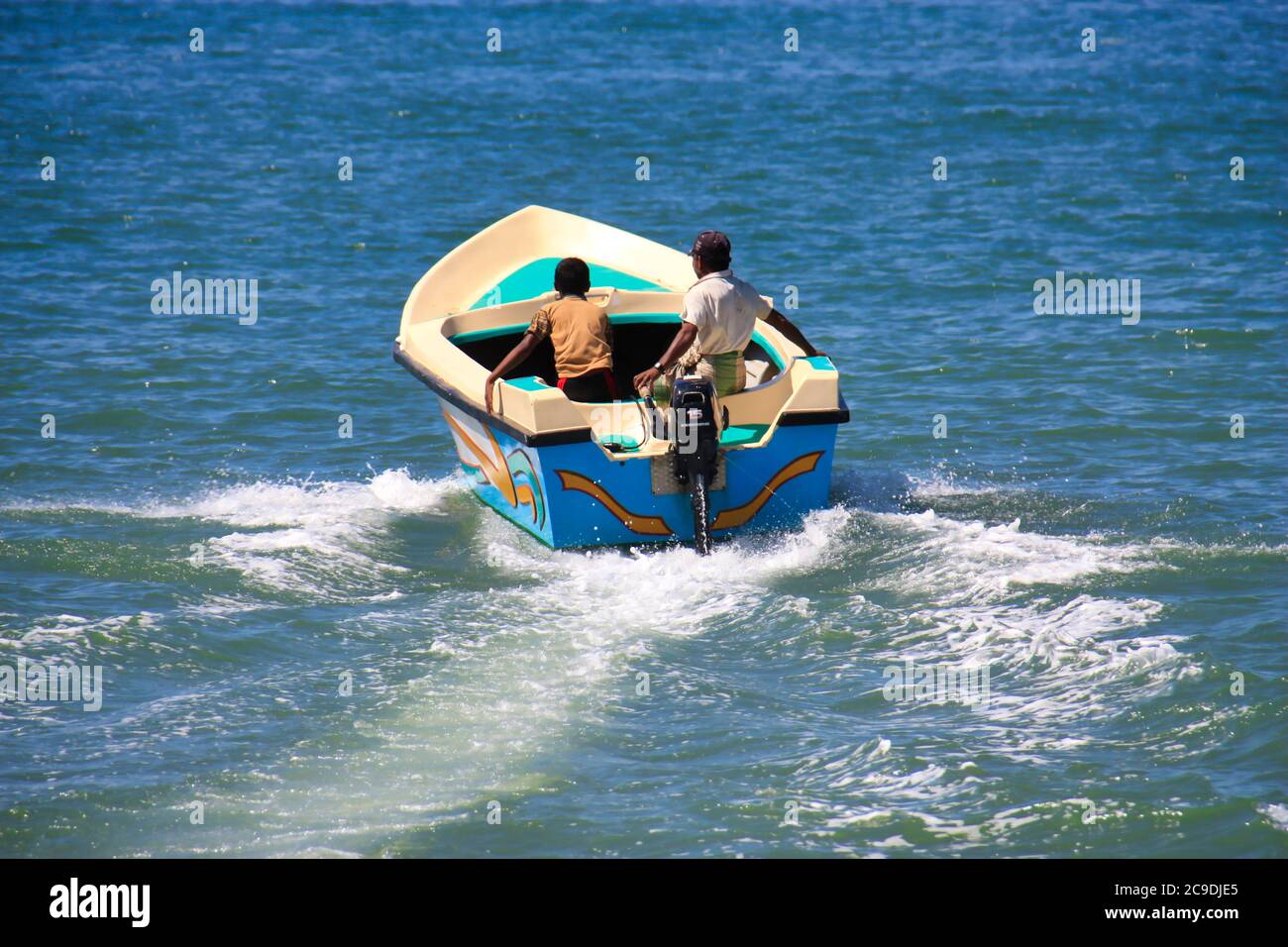 fishermen on the boat in action Stock Photo - Alamy