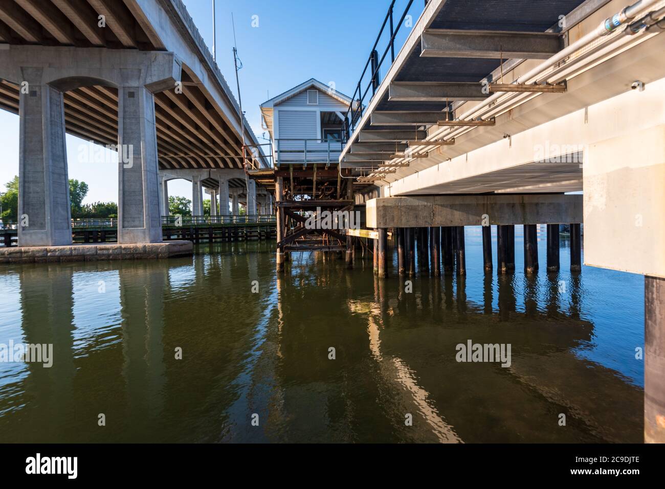 A wide angle photo looking up at a Shark river overpass with a ...