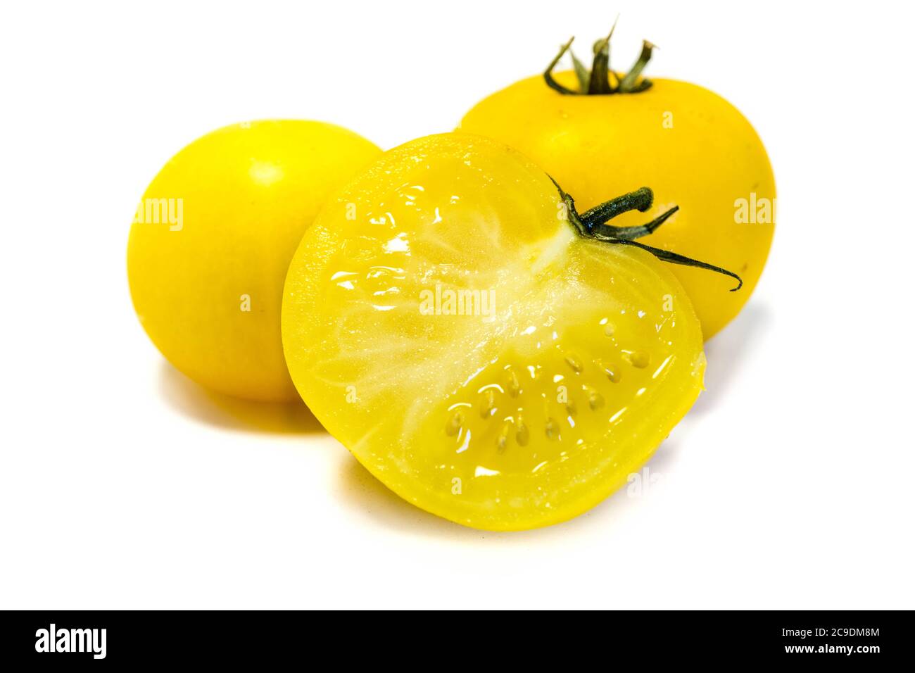 yellow tomato isolated on white background Stock Photo - Alamy