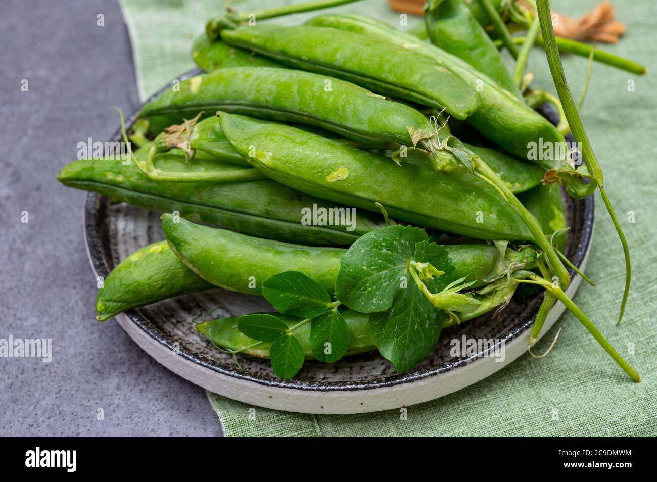 New harvest of fresh ripe green peas legumes Stock Photo - Alamy