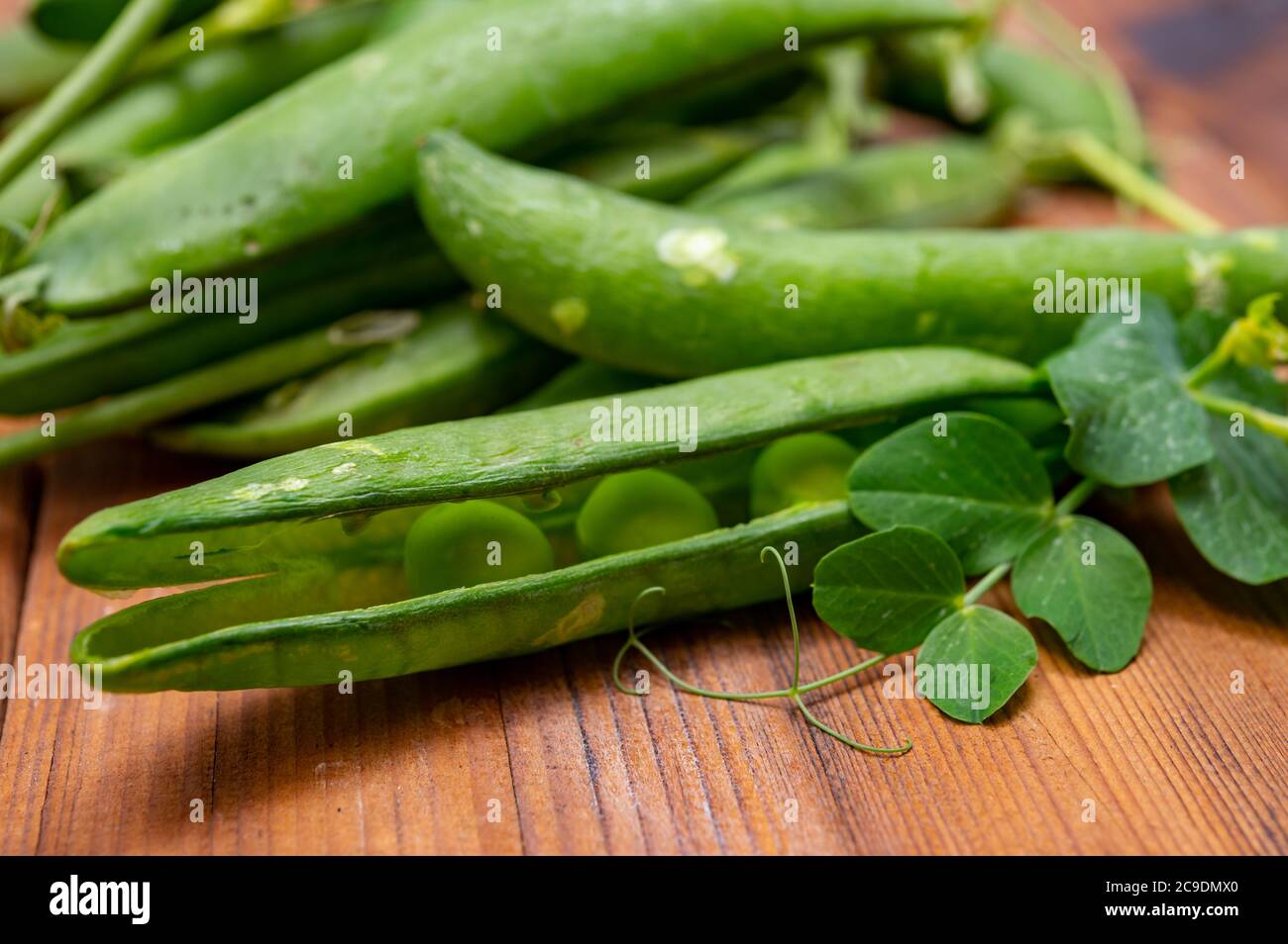 New harvest of fresh ripe green peas legumes Stock Photo - Alamy