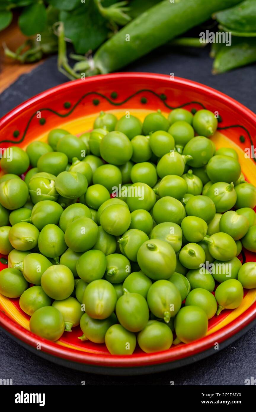 New harvest of fresh ripe green peas legumes Stock Photo - Alamy