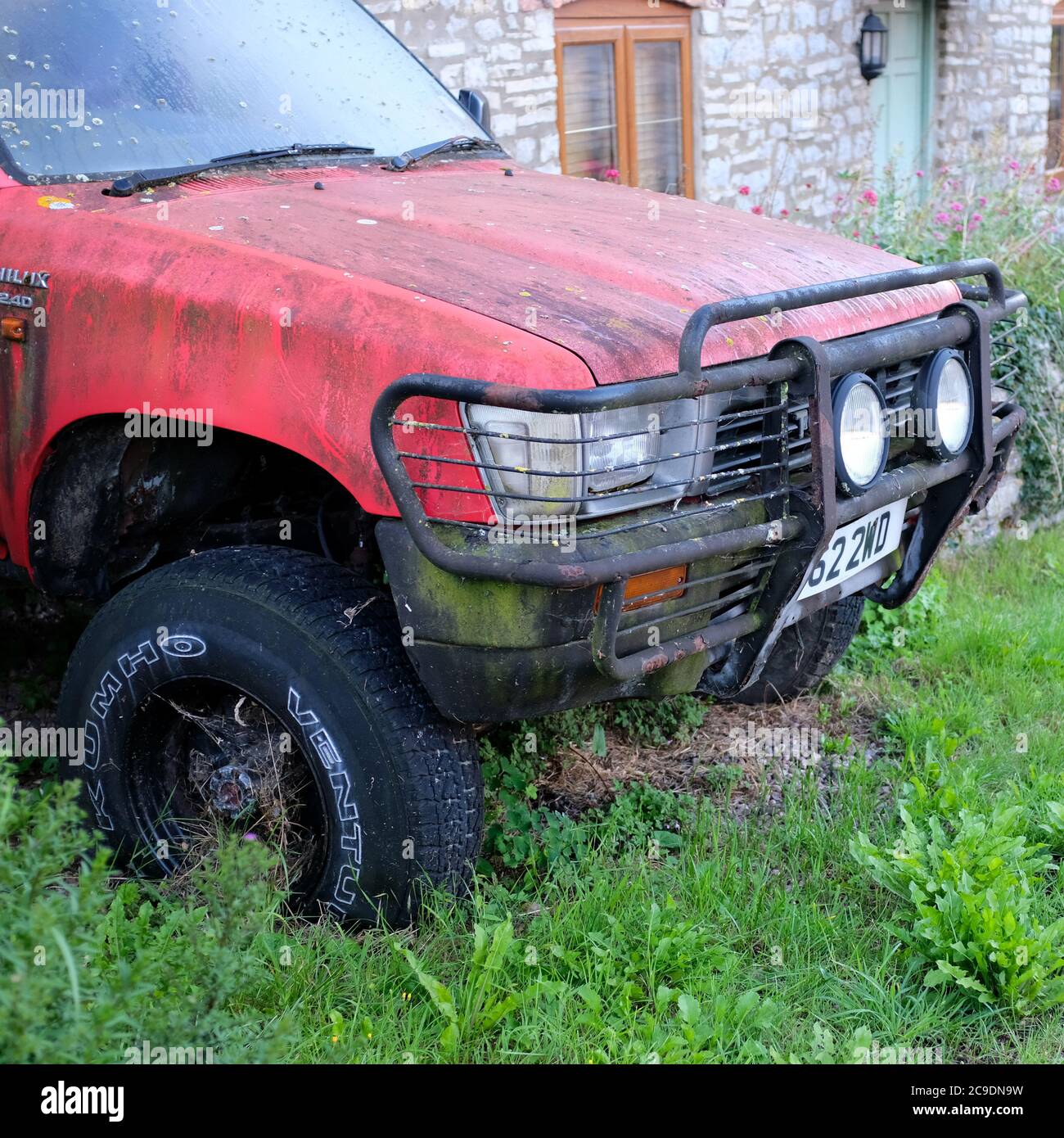 July 2020 - Old red Toyota pickup truck rotting away unloved Stock ...