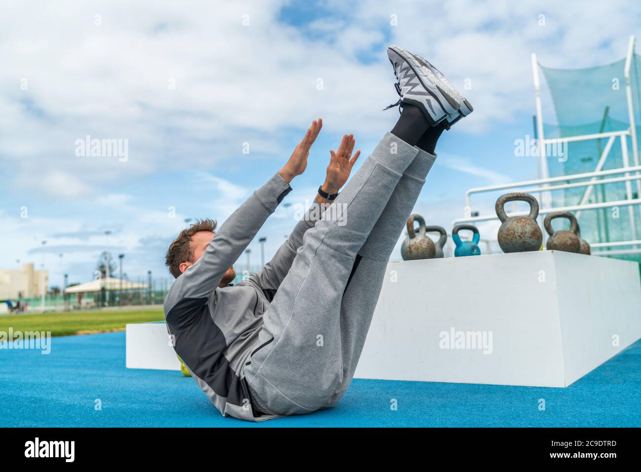 Abs exercise leg lift toe touch sit-up workout man strength training at ...