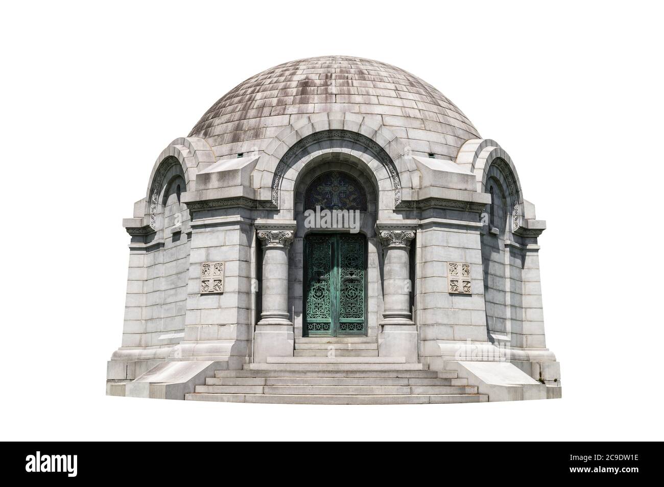 Dome-shaped stone mausoleum with Christian symbols and wrought-iron ...
