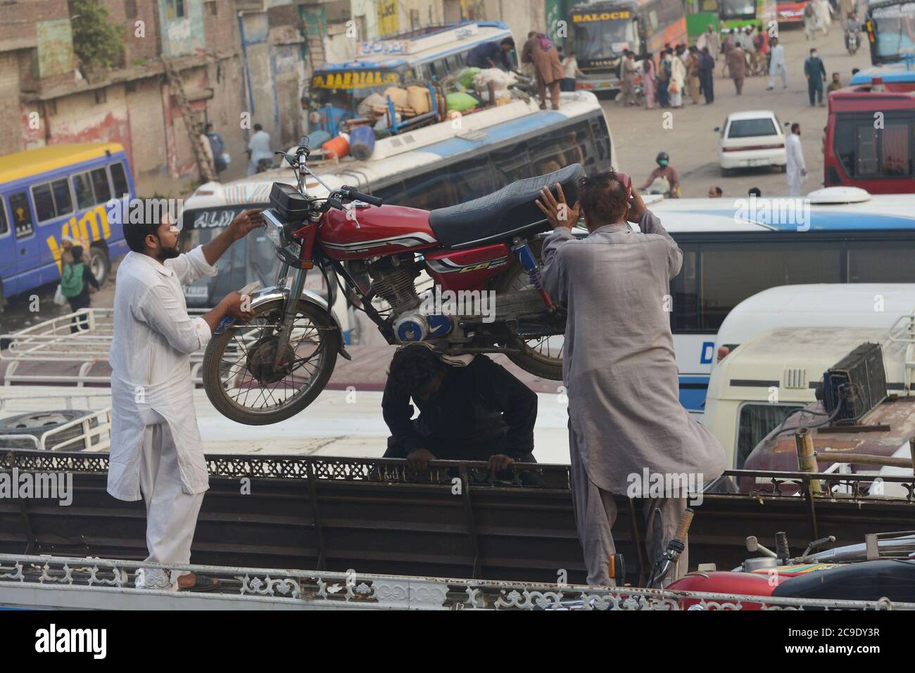 Lahore, Pakistan. 30th July, 2020. Pakistani passengers travel on the ...