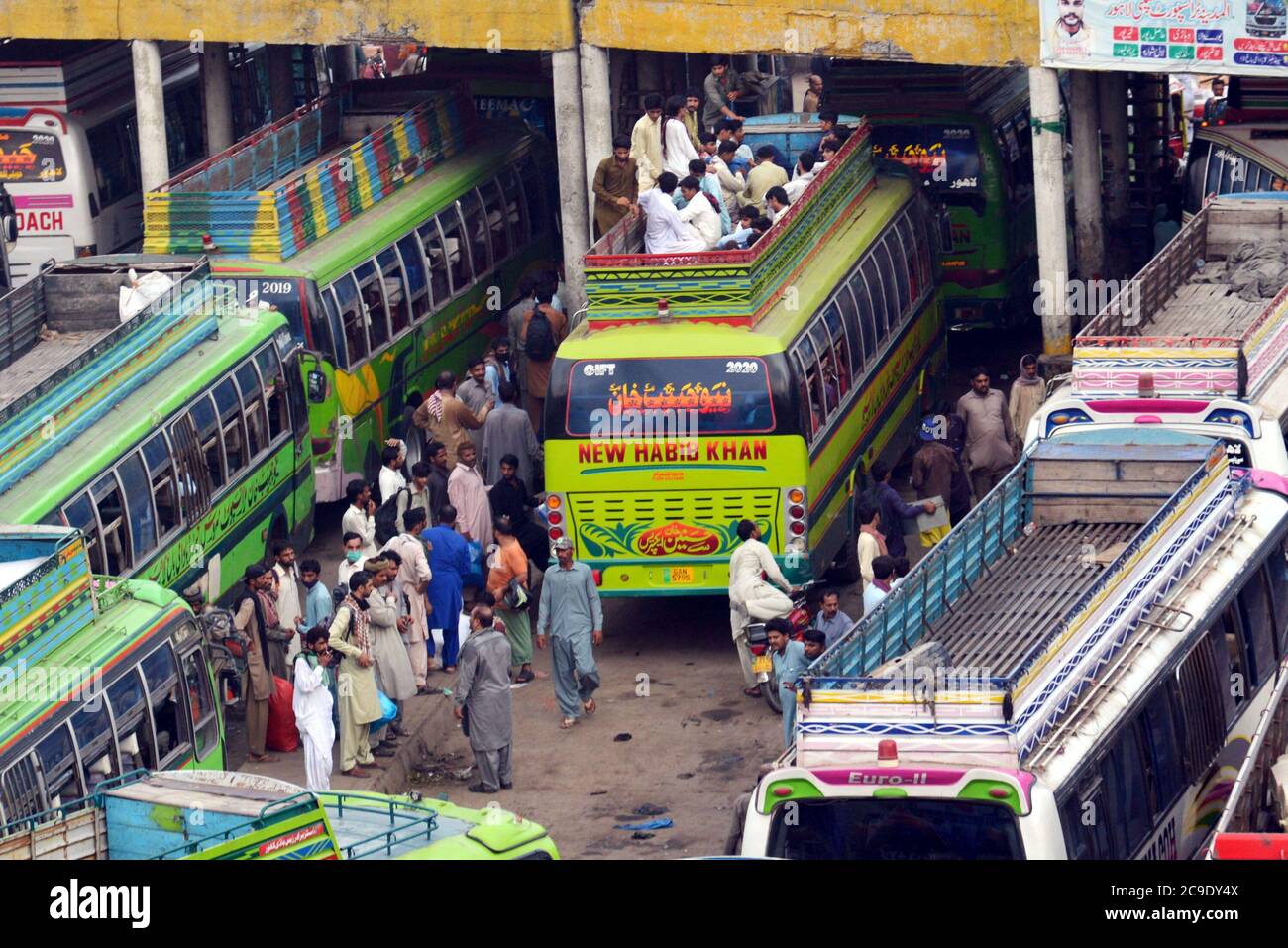 Lahore, Pakistan. 30th July, 2020. Pakistani passengers travel on the ...