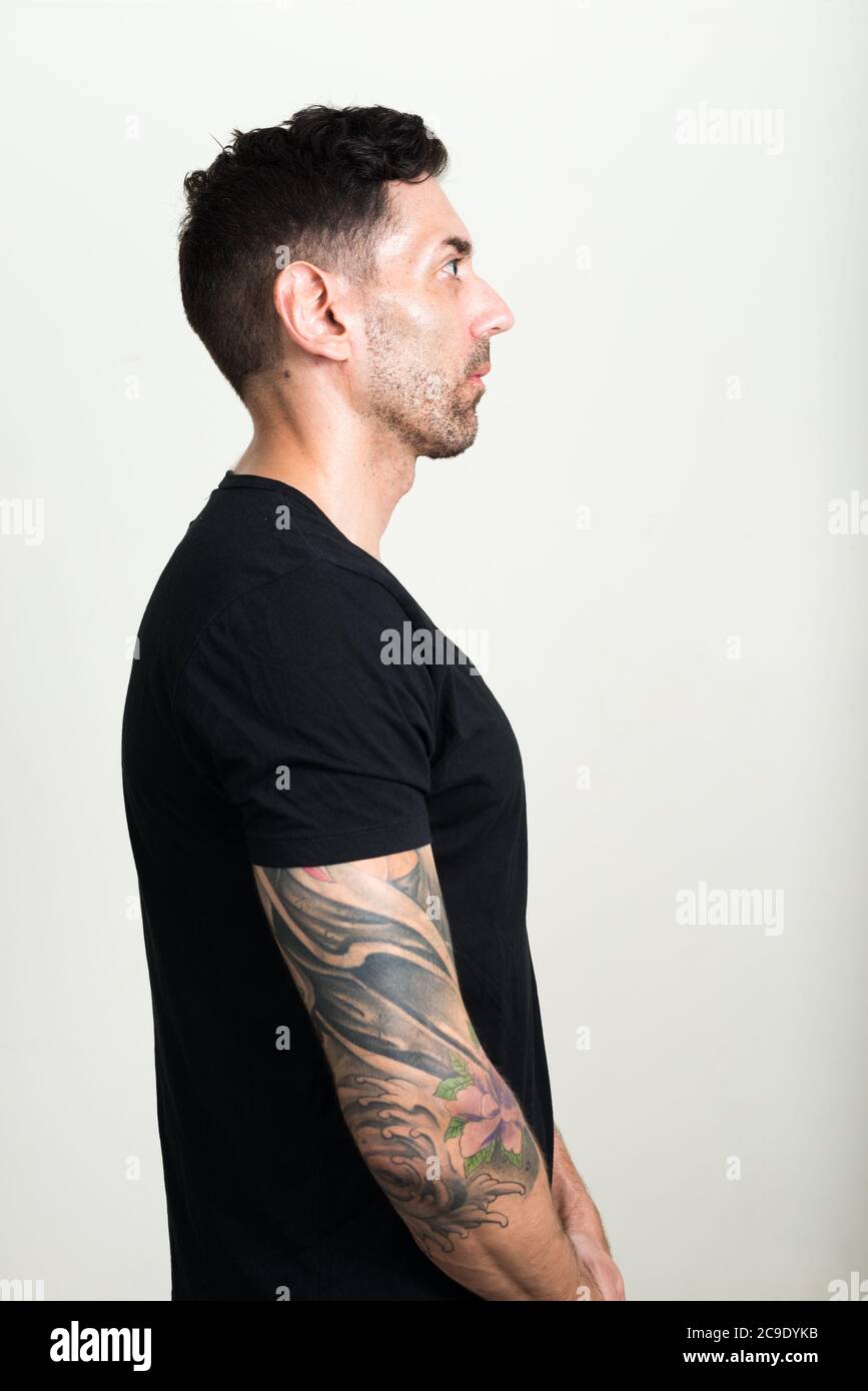 Portrait of handsome bearded man as rebel Stock Photo - Alamy