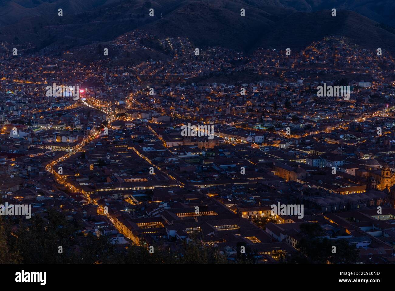 Panoramic night view over Cusco city in Peru Stock Photo - Alamy