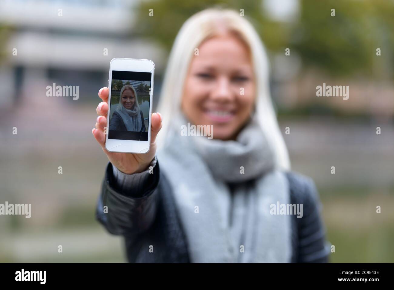 Beautiful blonde woman taking selfie hi-res stock photography and ...