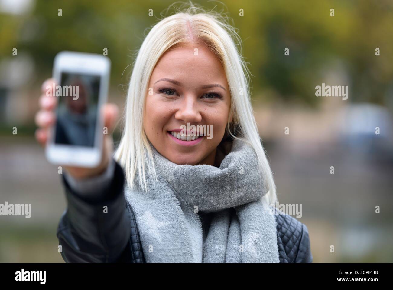 Beautiful blonde woman taking selfie hi-res stock photography and ...