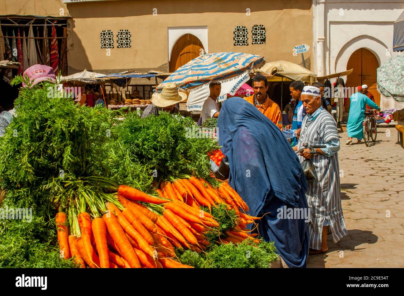 People shopping for produce in the Medina (old town) of Taroudant in ...