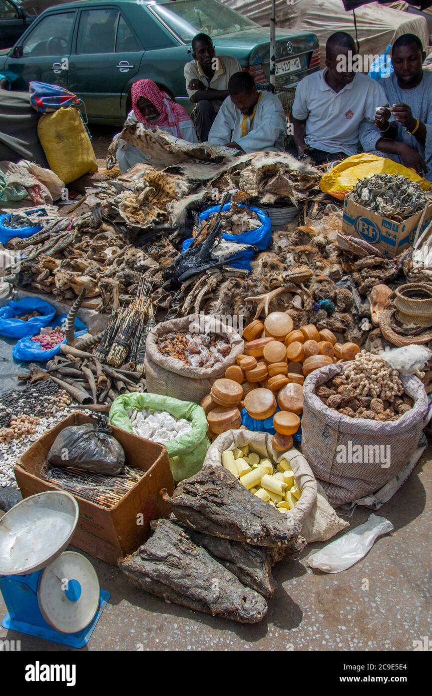 A small market with traditional medicines and dried animal parts in a ...