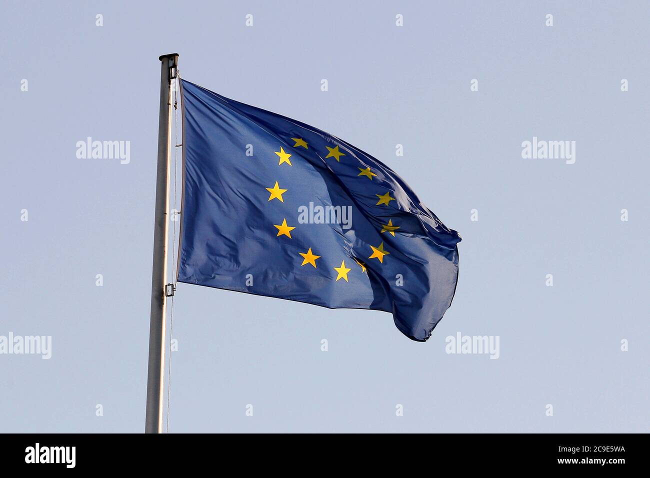 Eu stars on blue flag hi-res stock photography and images - Alamy