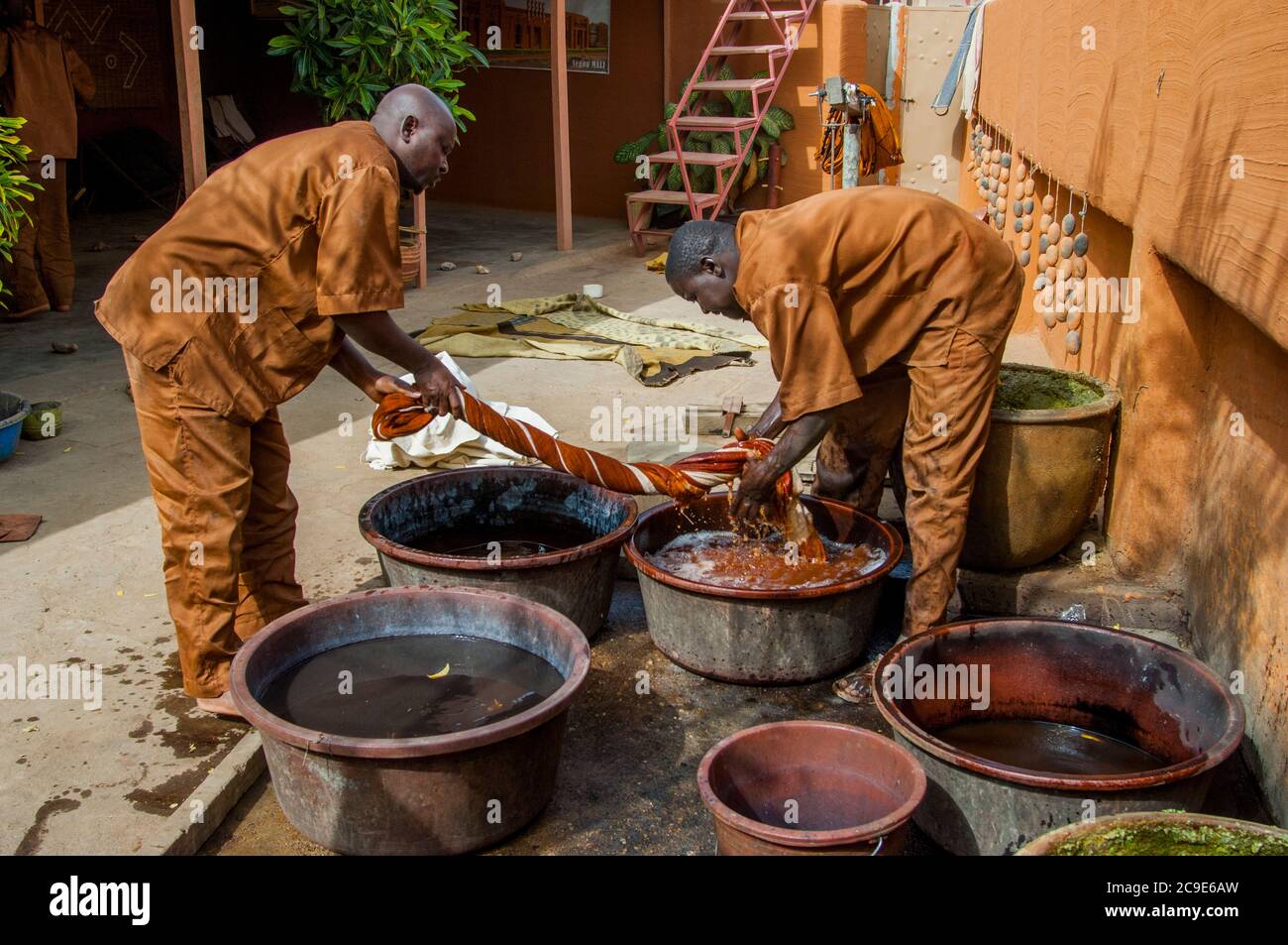 The production of traditional Bambara tribe Bogolanfini or bogolan, a ...