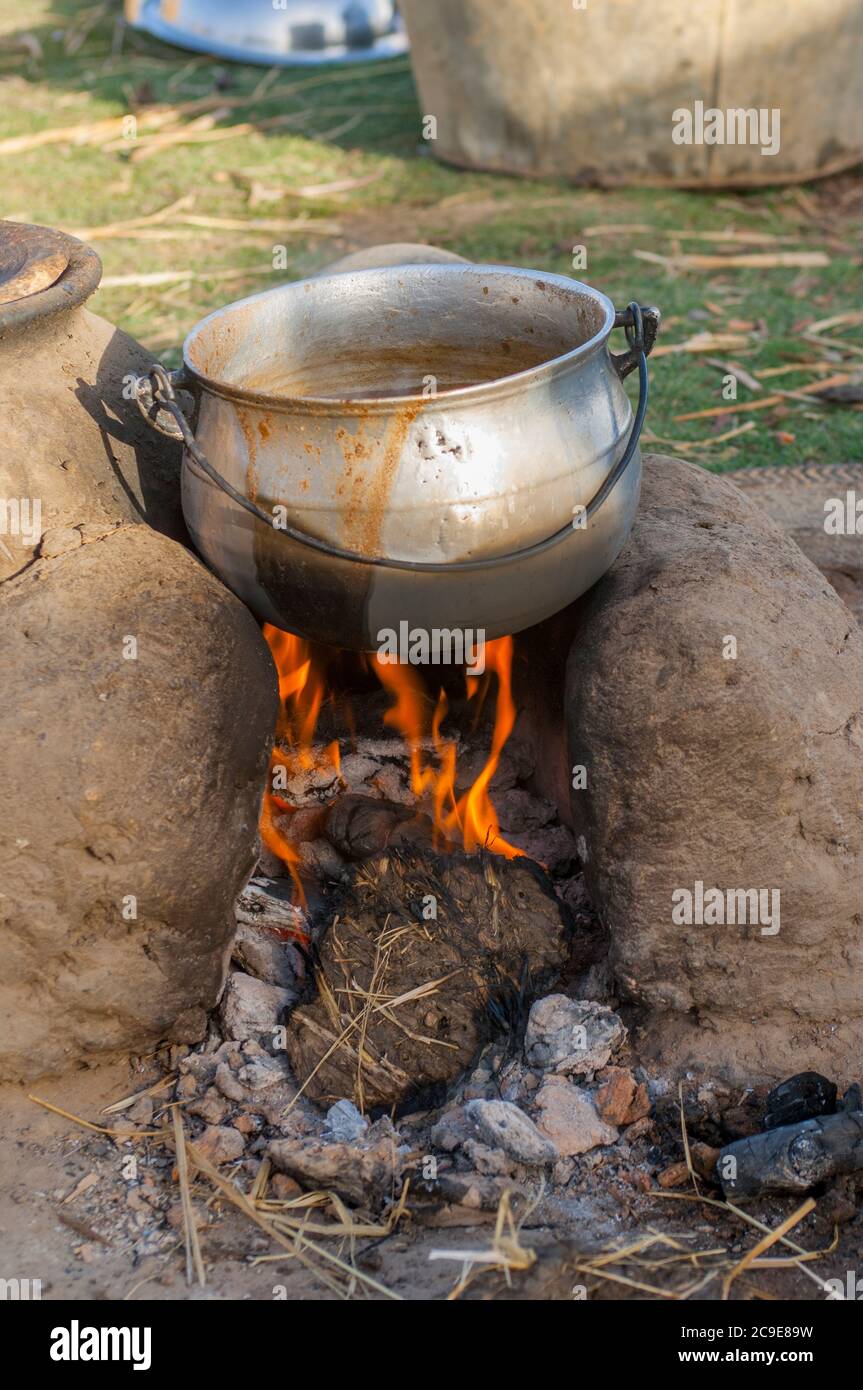 Cow dung used for cooking in a village on the banks of the Niger River ...