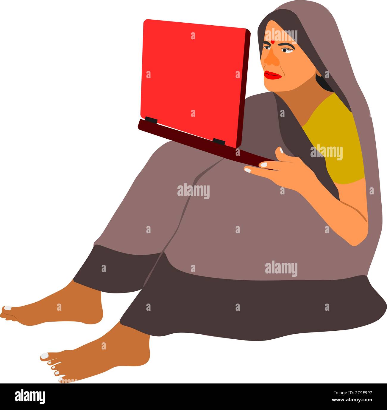 An indian village woman operating laptop wearing traditional sari on ...