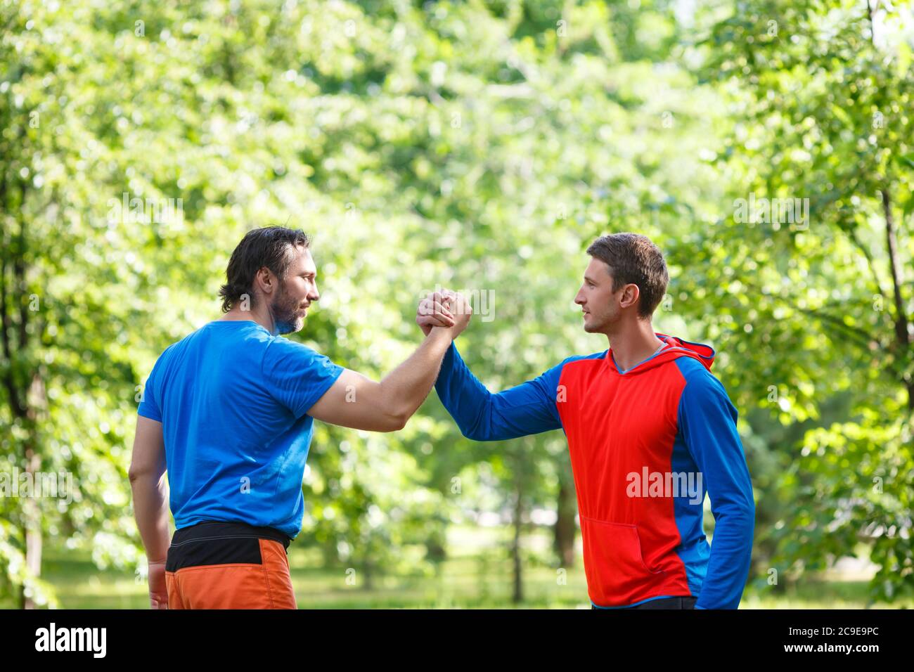 Two men after workout outdoor. Active and healthy lifestyle concept ...