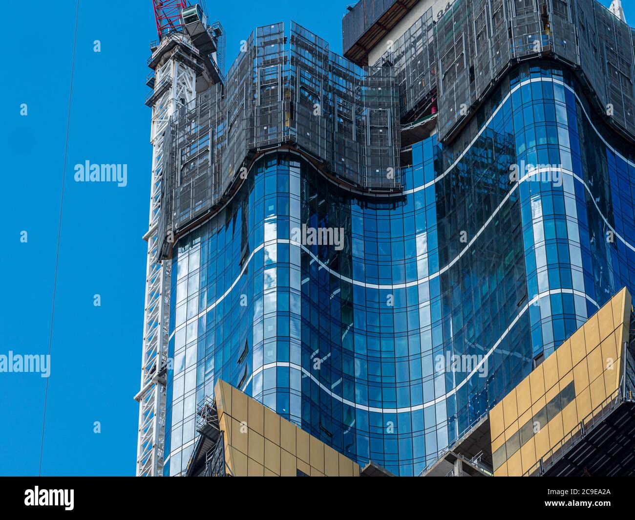 Scaffolding high rise building new construction hi-res stock ...