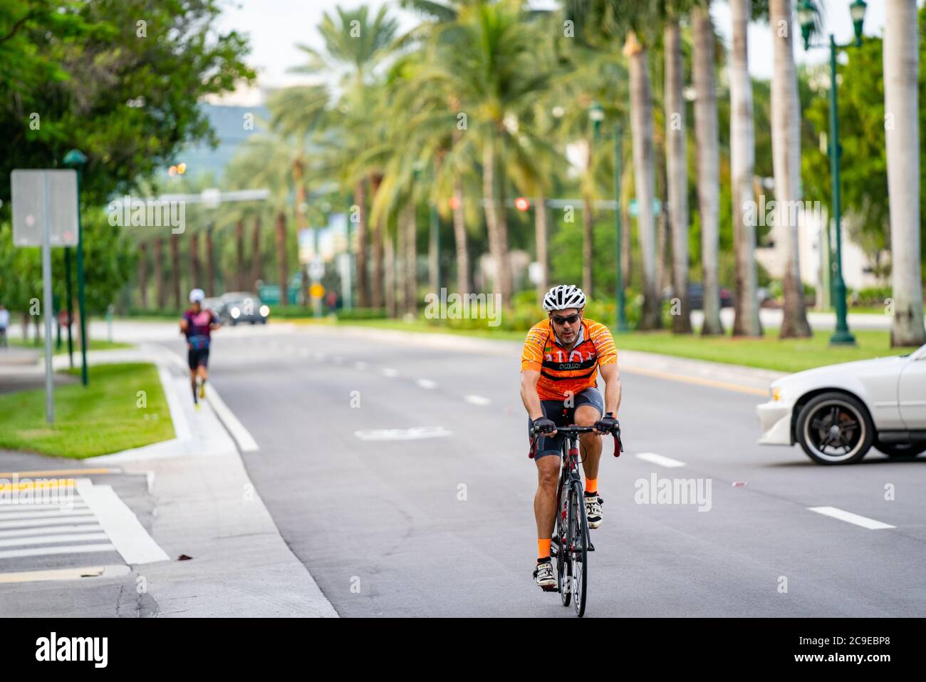 Image of an adult male riding a sports racing bike Stock Photo - Alamy