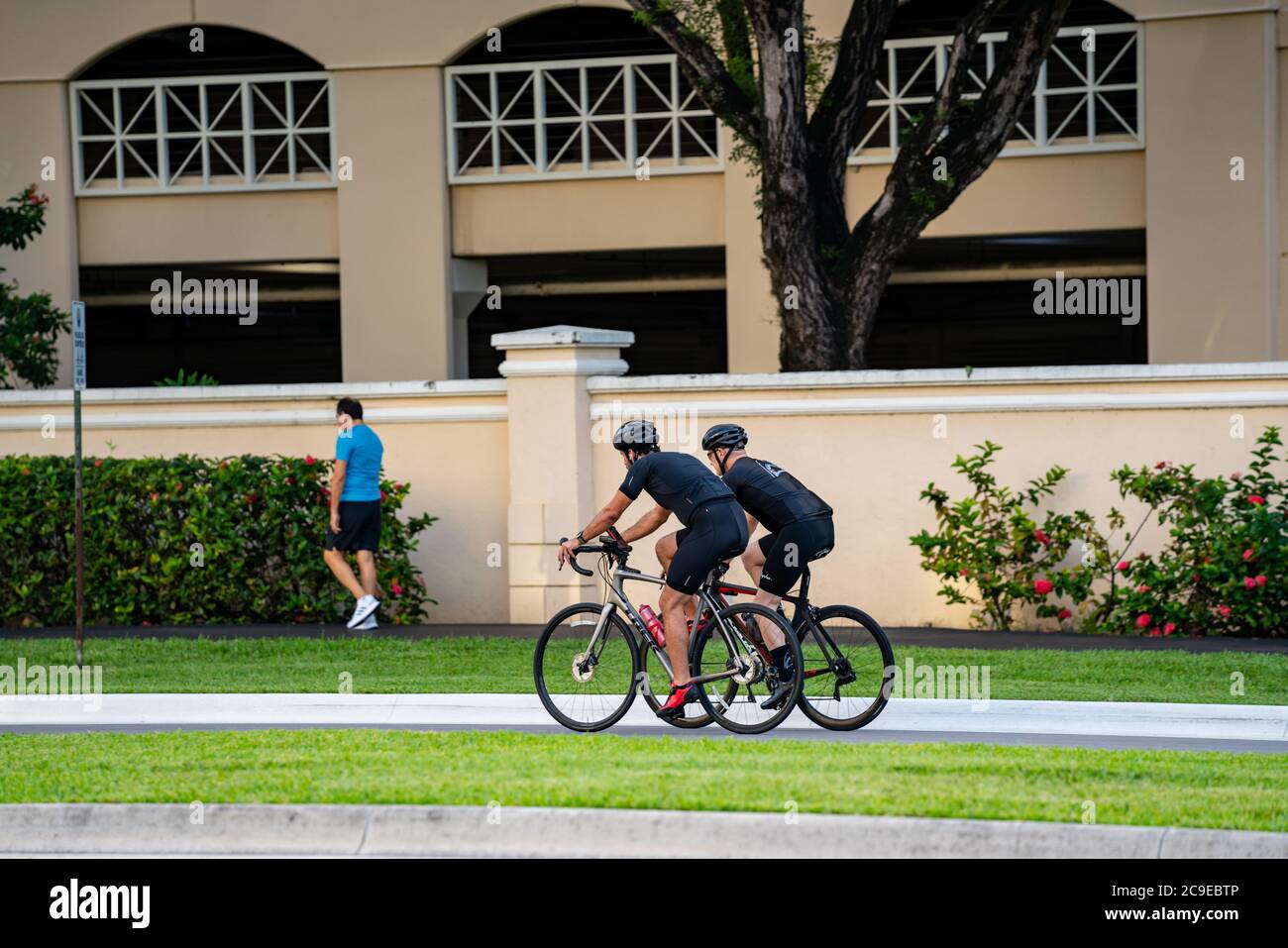 Two men riding High Resolution Stock Photography and Images - Alamy