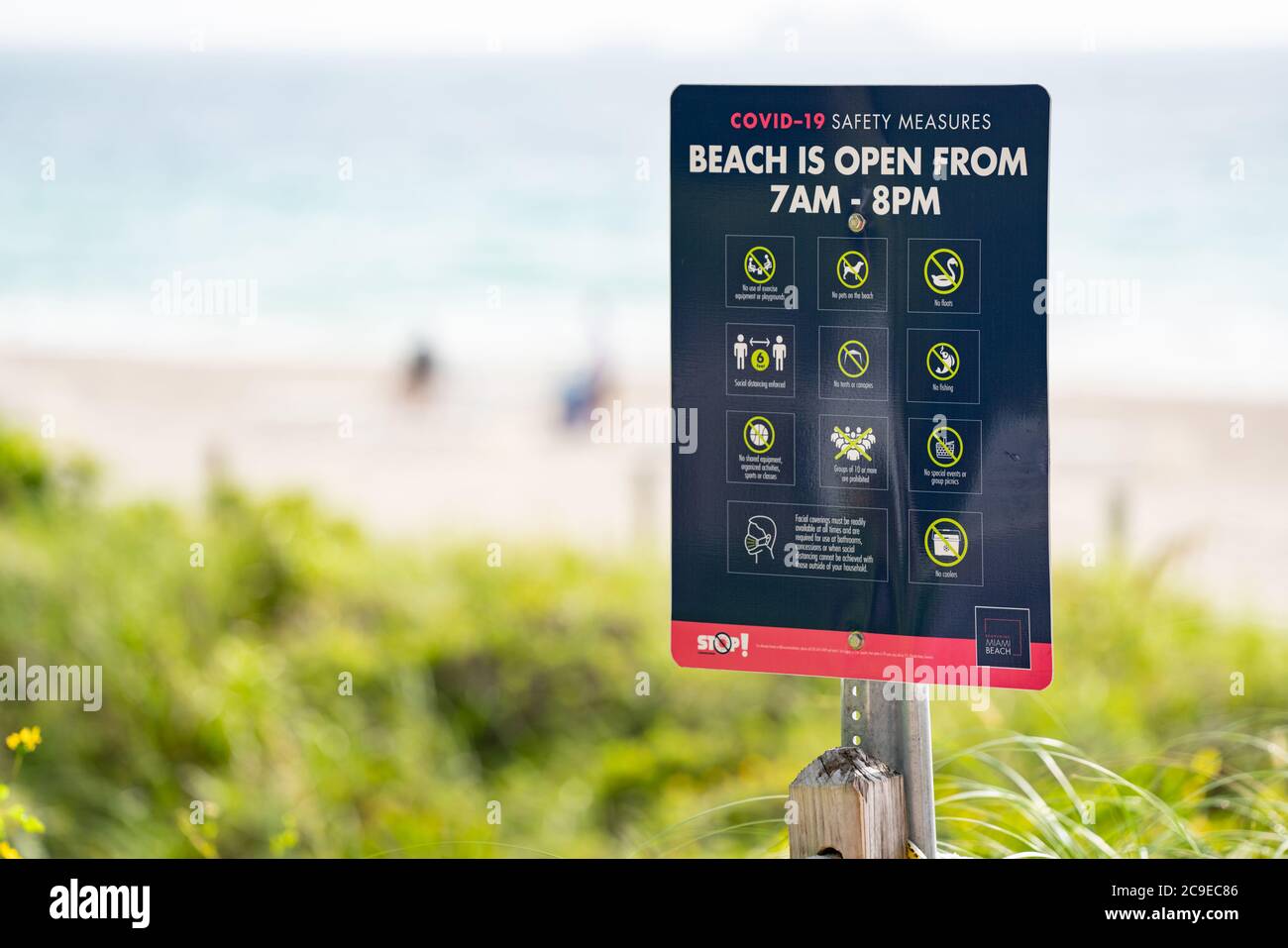 Photo of a beach sign Miami showing rules of social distancing and ...