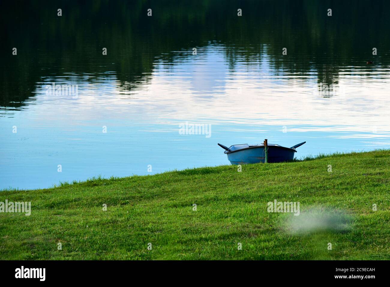 Lonely boat fishing hi-res stock photography and images - Alamy