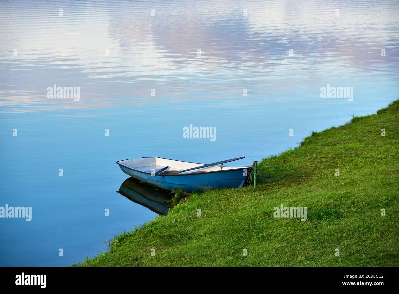 Lonely boat fishing hi-res stock photography and images - Alamy