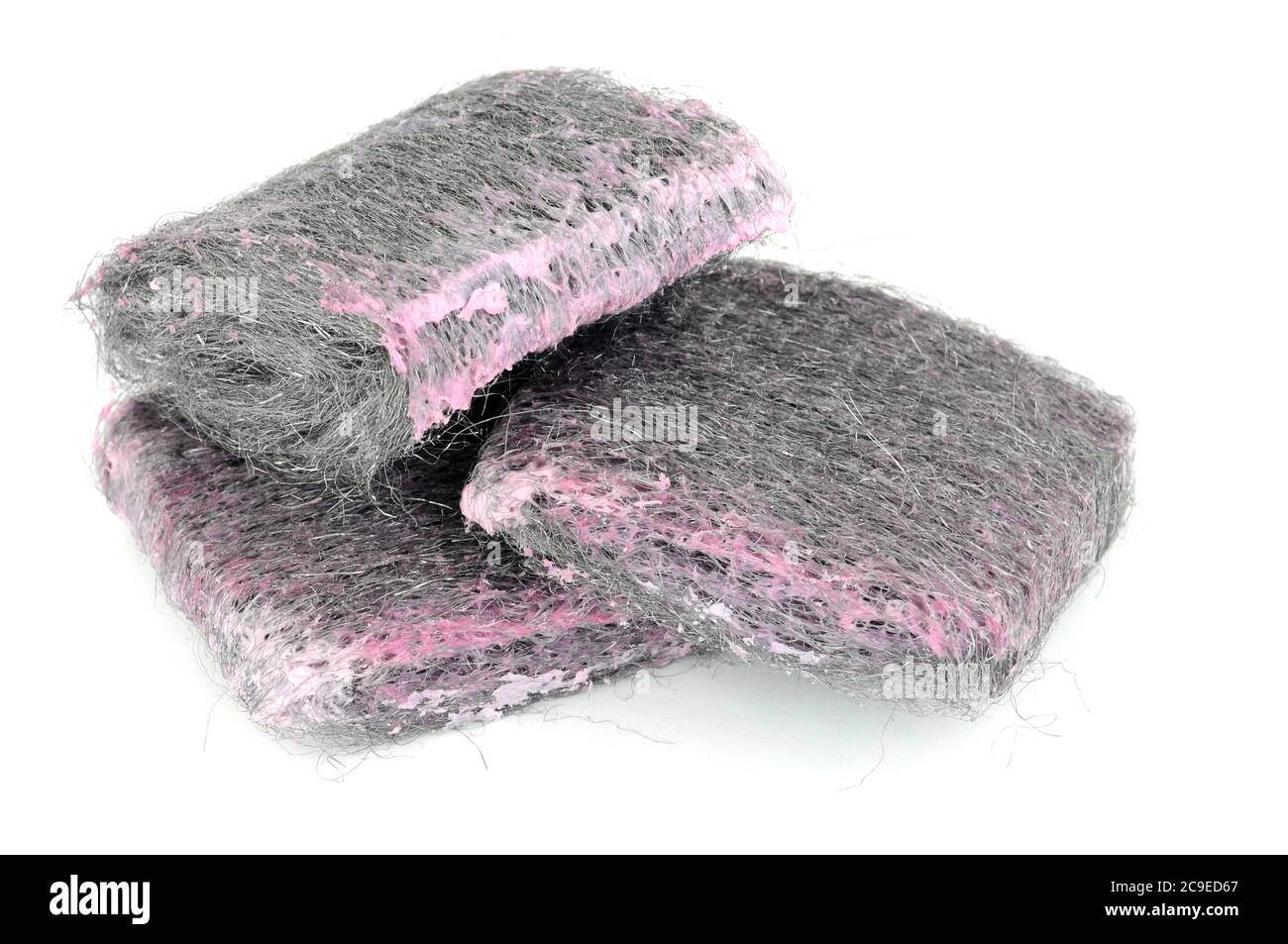 Soap filled wire wool scouring pads isolated on a white background ...